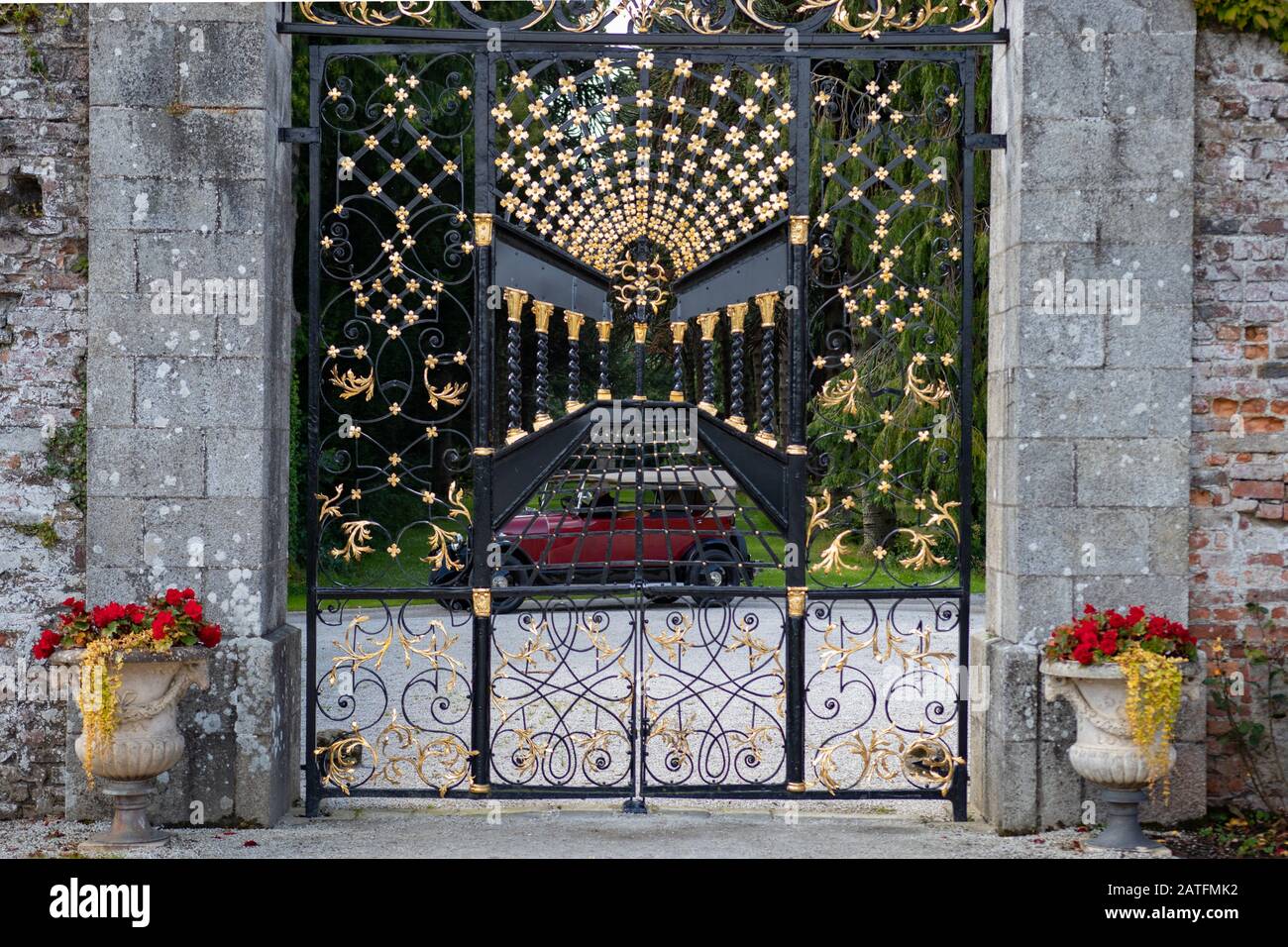 Black iron gate with gold hi-res stock photography and images - Alamy