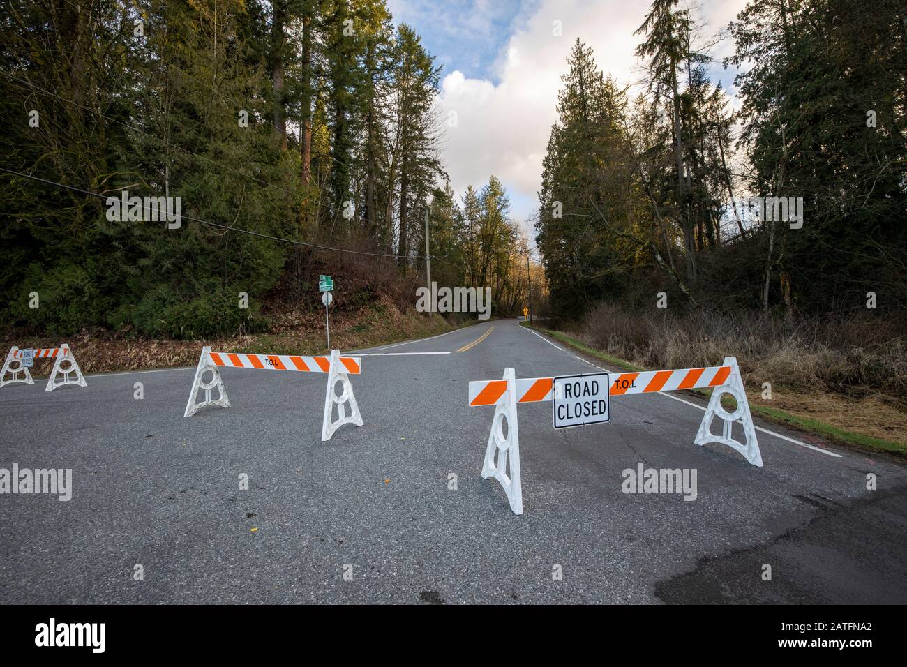 Road closed by barriers blocking access wide angle Stock Photo - Alamy