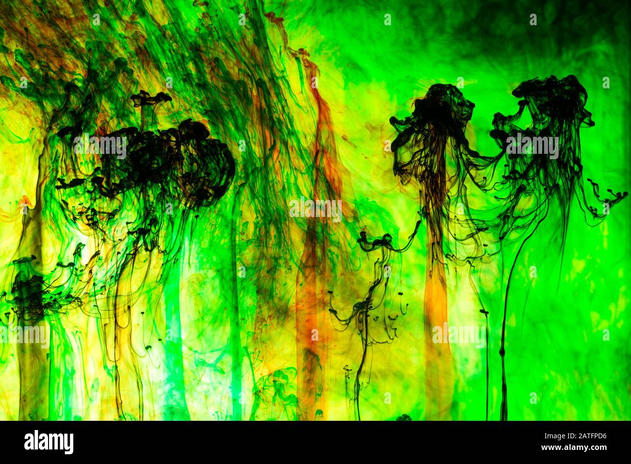 Acrylic colors and ink in water. Abstract background Stock Photo - Alamy