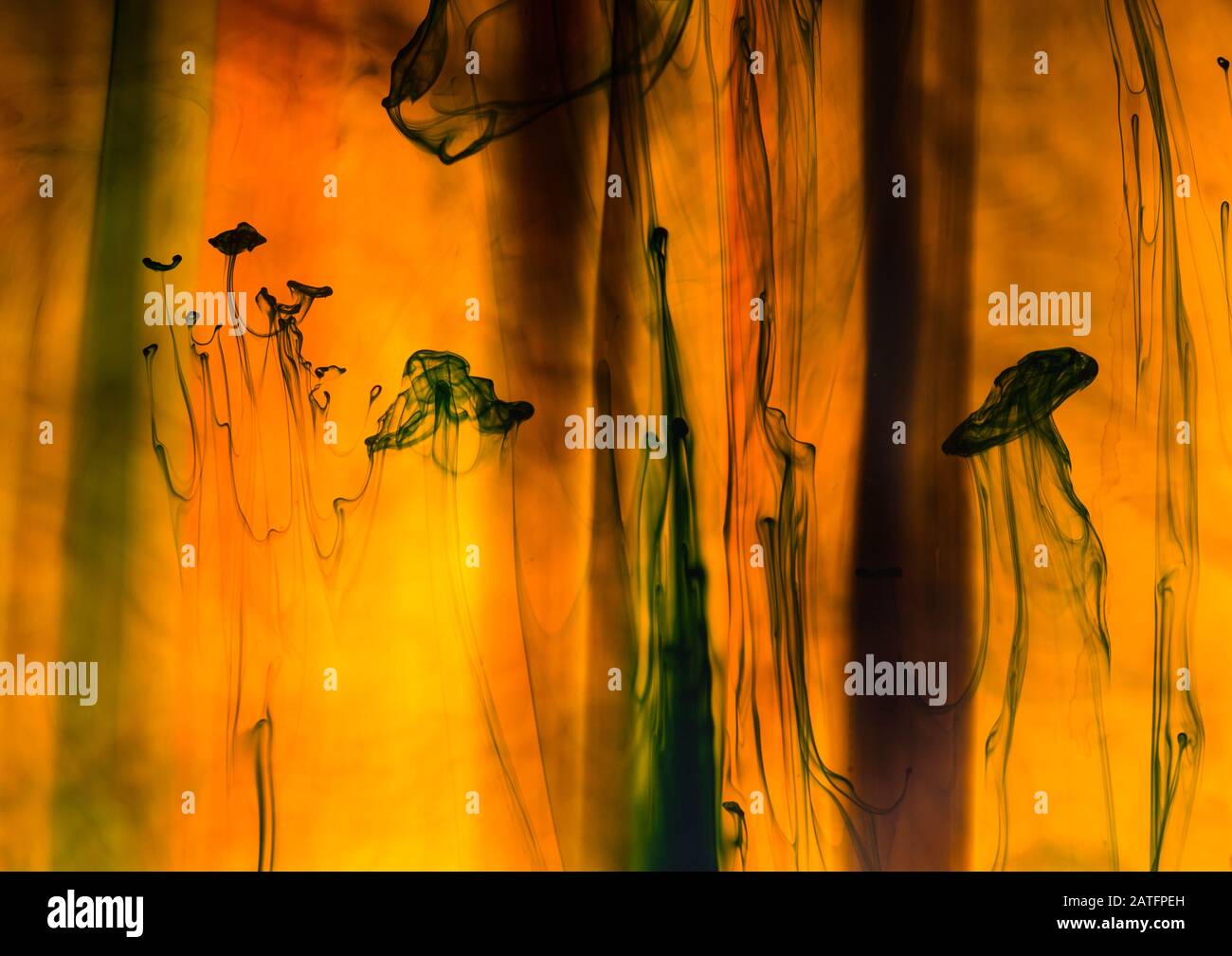 Acrylic colors and ink in water. Abstract background Stock Photo - Alamy