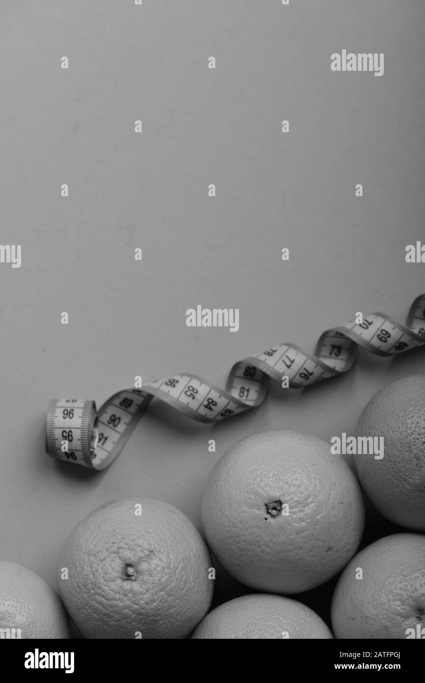 Twisted measuring tape Black and White Stock Photos & Images - Alamy