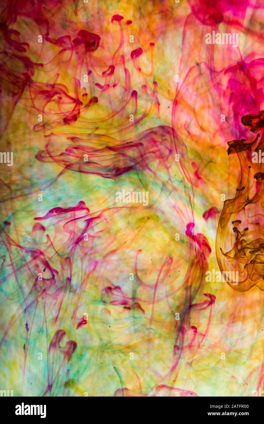 Acrylic colors and ink in water. Abstract background Stock Photo - Alamy