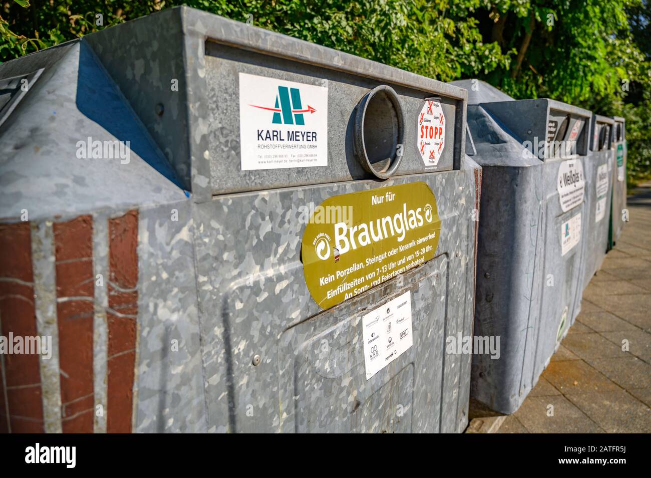 Berlin, Germany - August 19, 2019: Glass container from a recycling ...