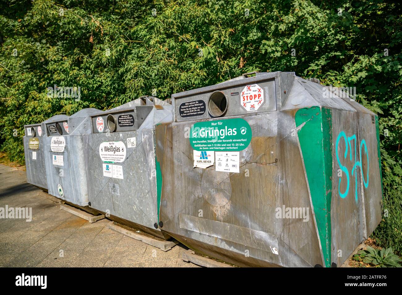 Berlin, Germany - August 19, 2019: Glass container from a recycling ...