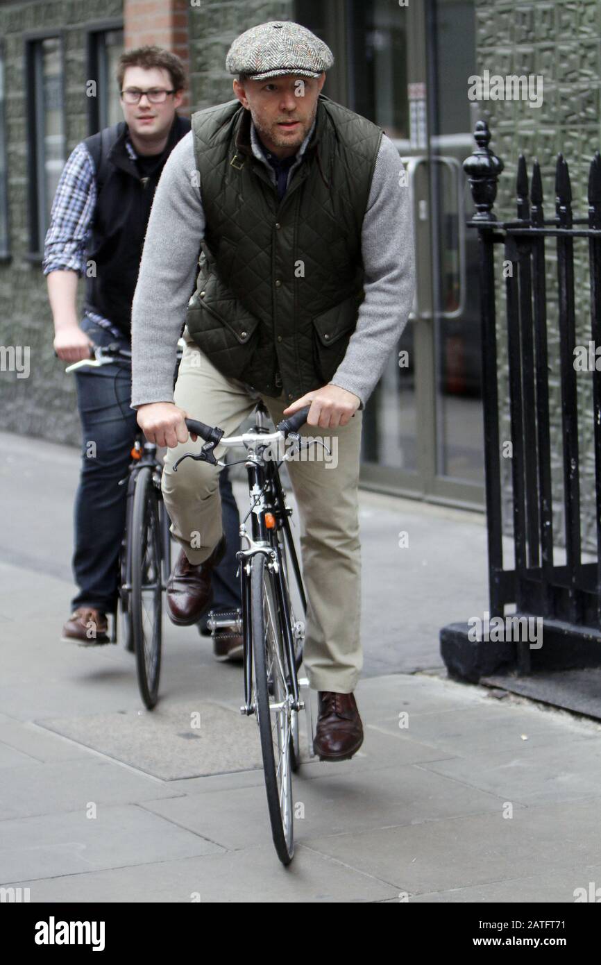 Guy Ritchie on bike in soho London 25/05/2016 credit image Jack Ludlam ...