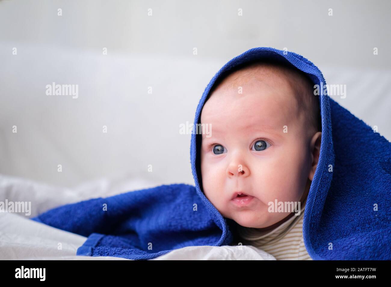 Baby wrapped in bath towel hi-res stock photography and images - Alamy