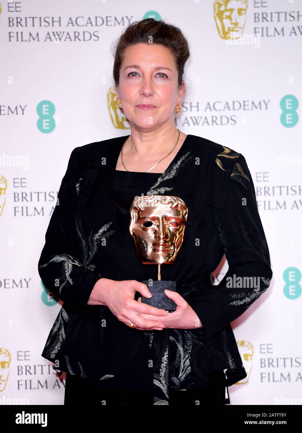 Jacqueline Durran with her award for Best Costume Design in the press ...