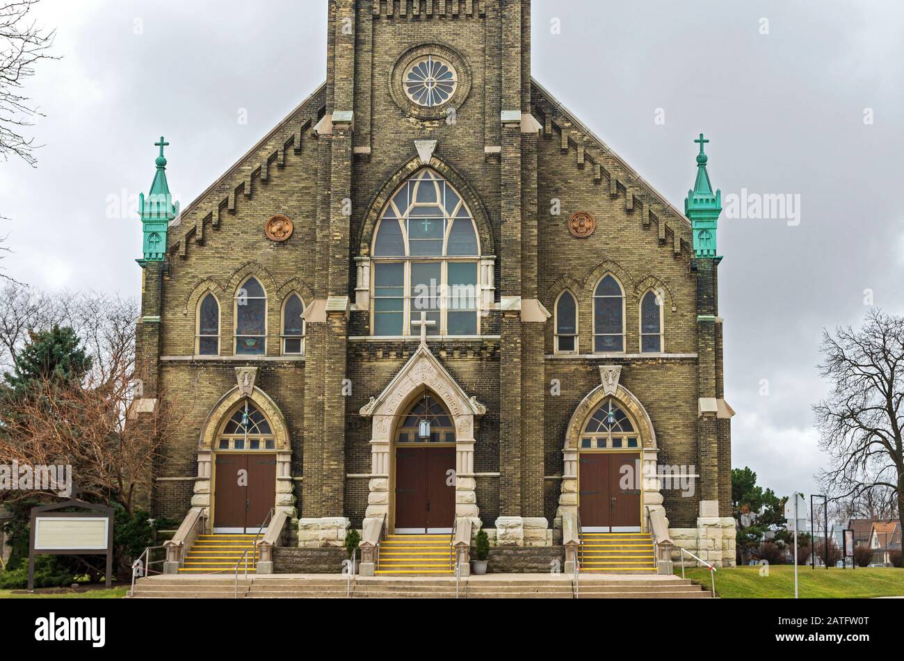 landmark neo-gothic style church front entrance and facade in lincoln ...