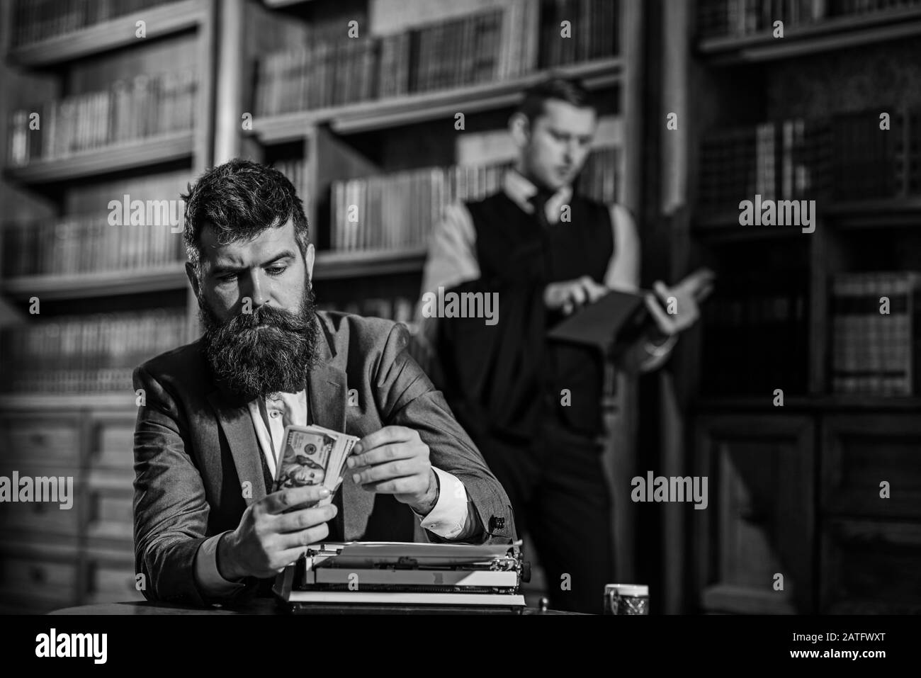 Man writing in vintage typewriter hi-res stock photography and images ...