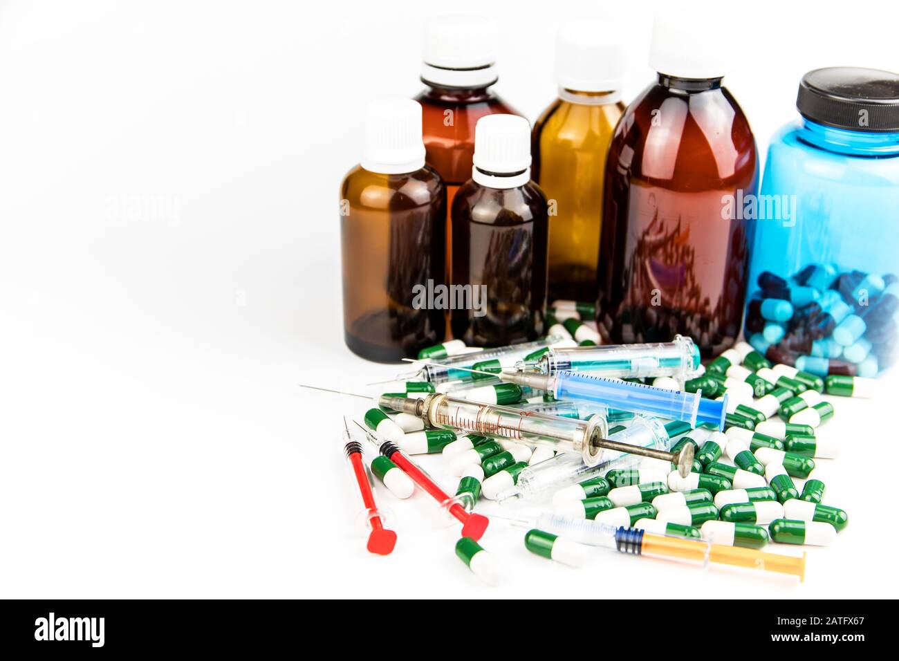 Syringe and drugs on white background. Flu vaccination. Treatment of ...