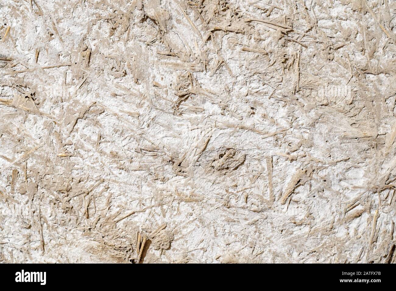Background of adobe clay plaster texture with straw Stock Photo - Alamy