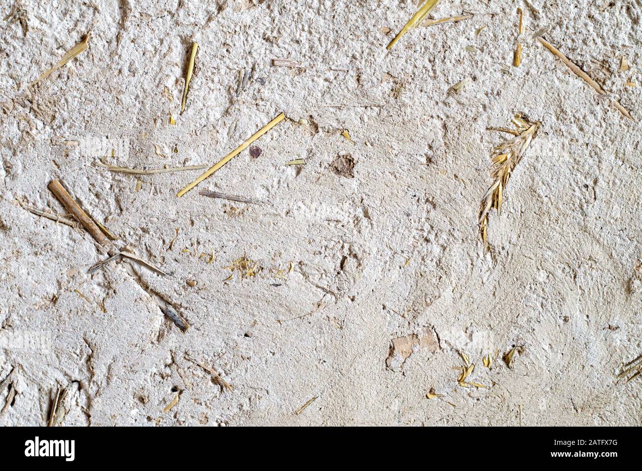 Background of adobe clay plaster texture with straw Stock Photo - Alamy