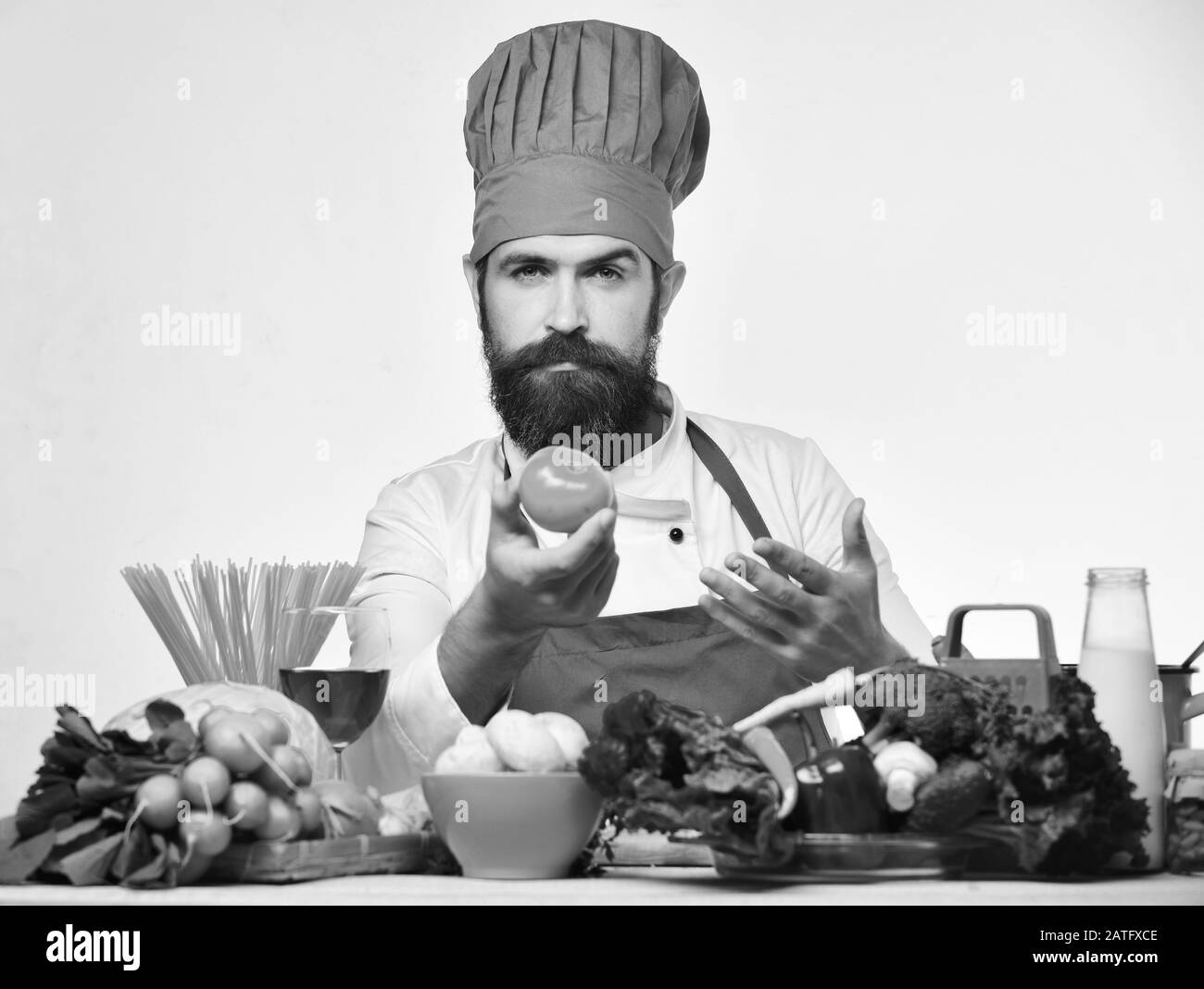 Male chef cooking vegetables Black and White Stock Photos & Images - Alamy