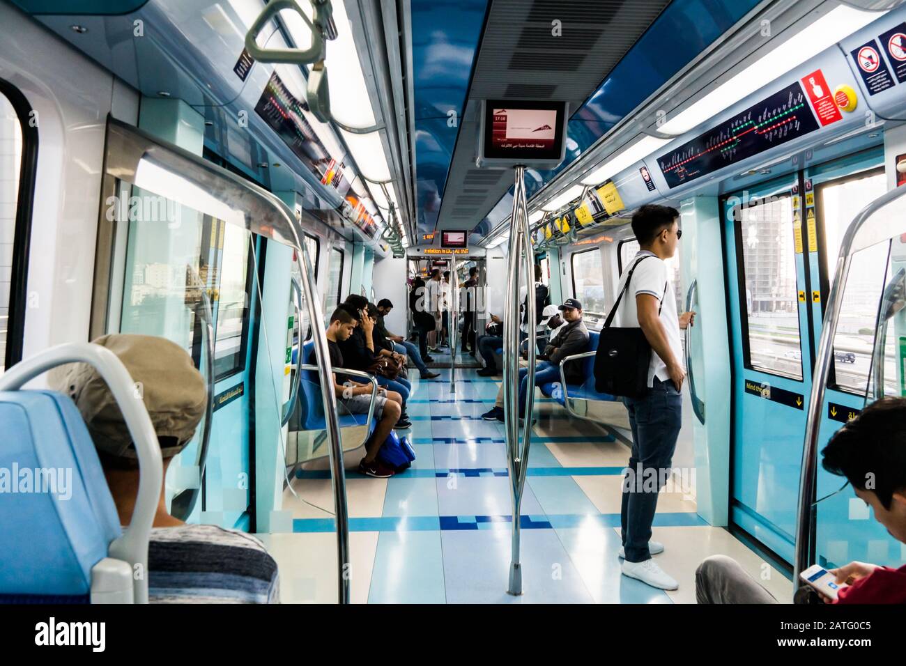 Riding in modern metro hi-res stock photography and images - Alamy