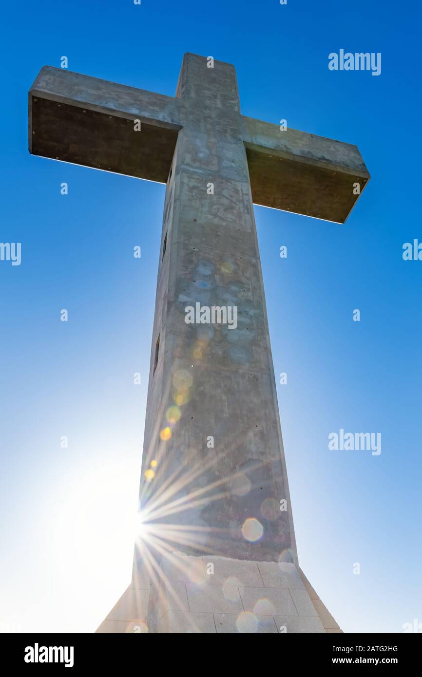 Sun rays come from behind of Gigantic cross in Monastery of Filerimos ...