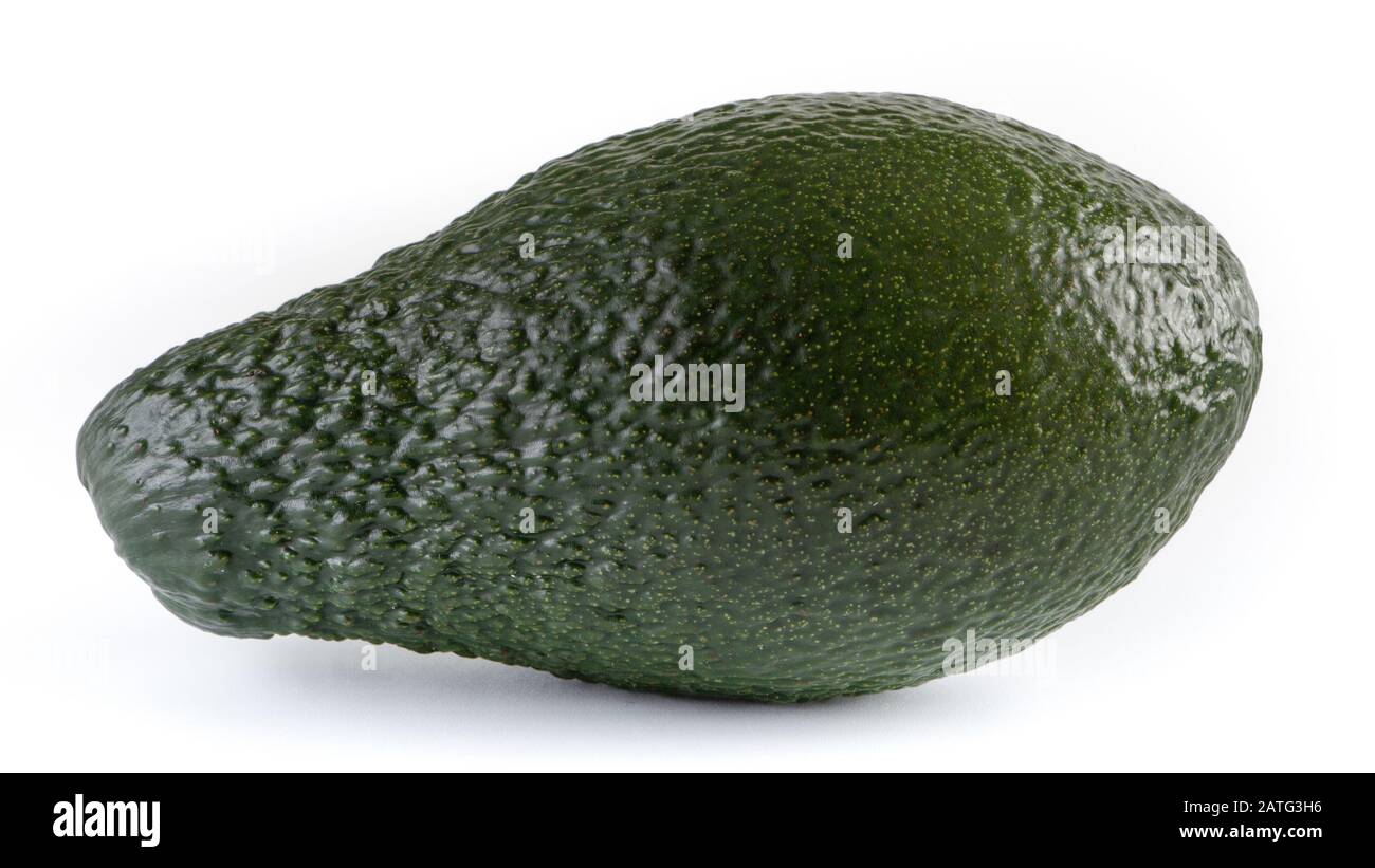 Green avocado closeup on a white background Stock Photo - Alamy