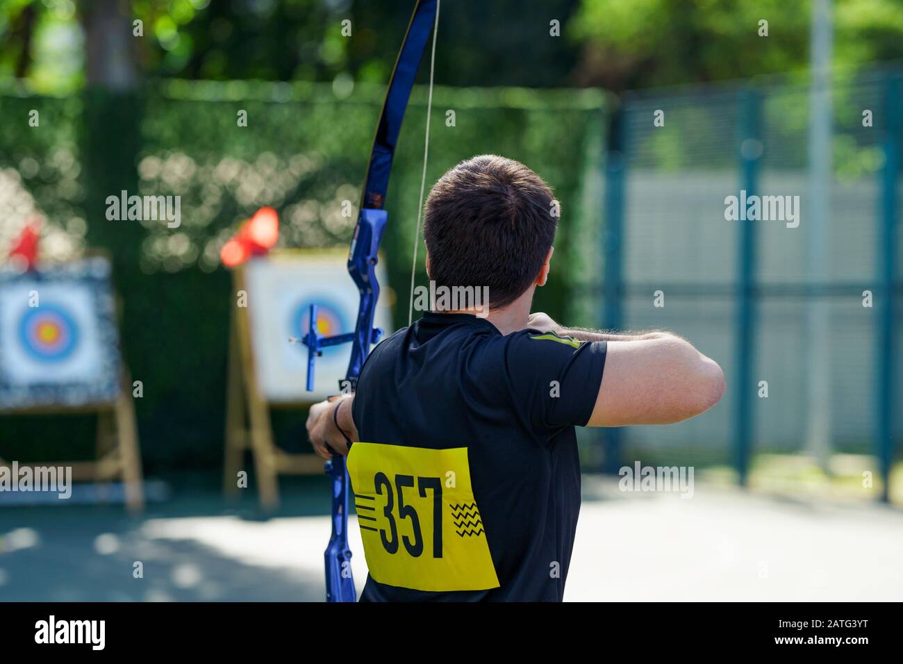 Sportsman is aiming at a target and about to shot Stock Photo - Alamy
