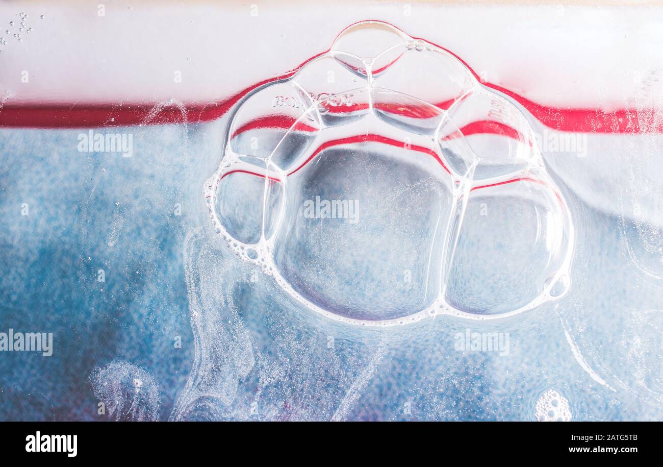 Oil bubbles inside water base form patterns Stock Photo - Alamy