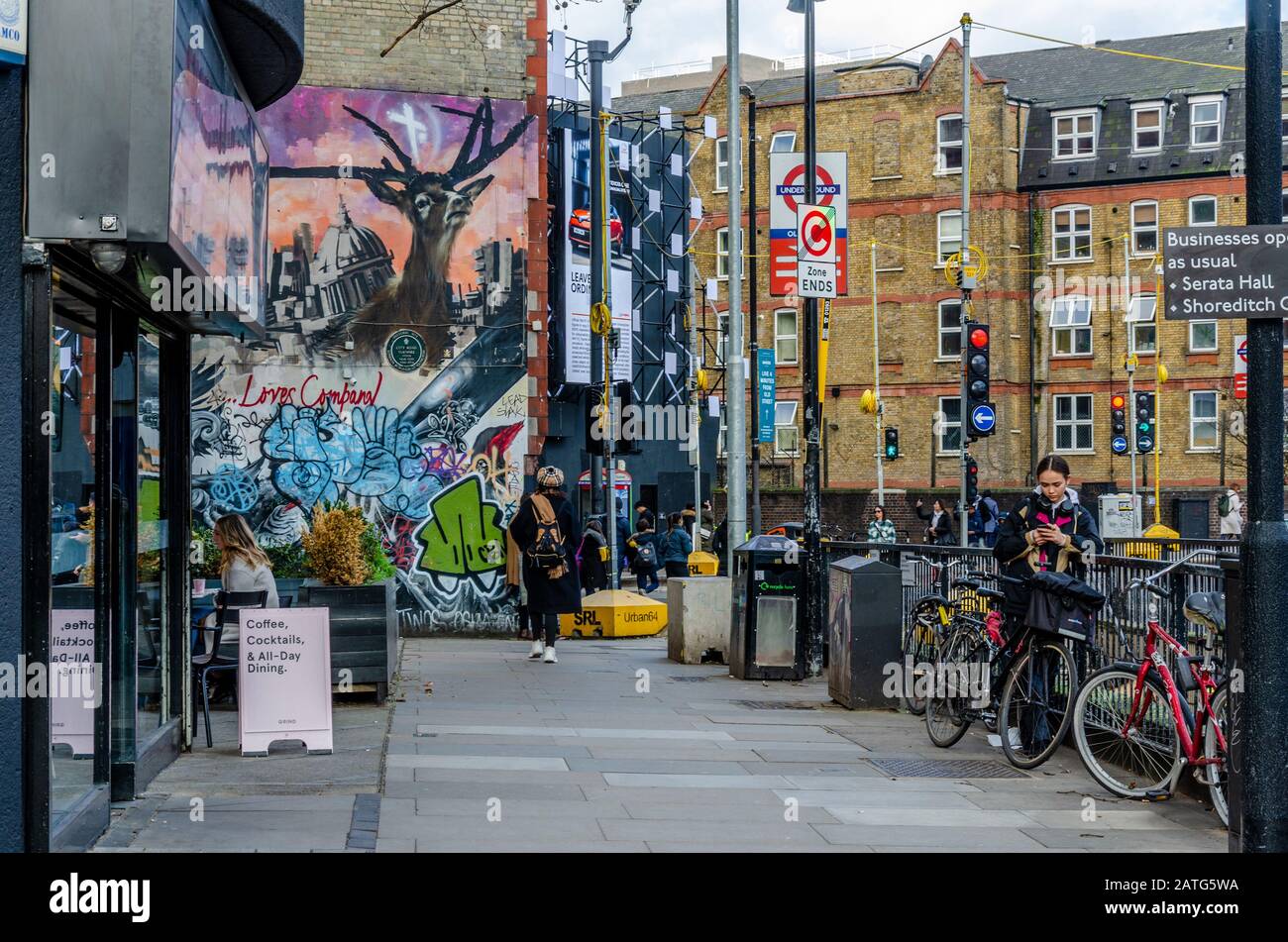A view along the pavement alongside City Road in London, UK. In the ...