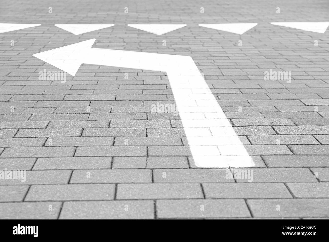 View of road with arrow marking Stock Photo - Alamy