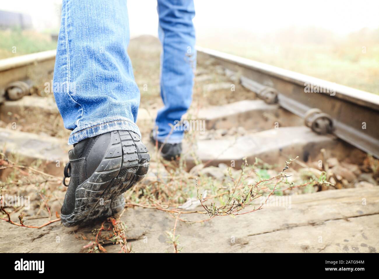 Railway track man walking distance hi-res stock photography and images ...