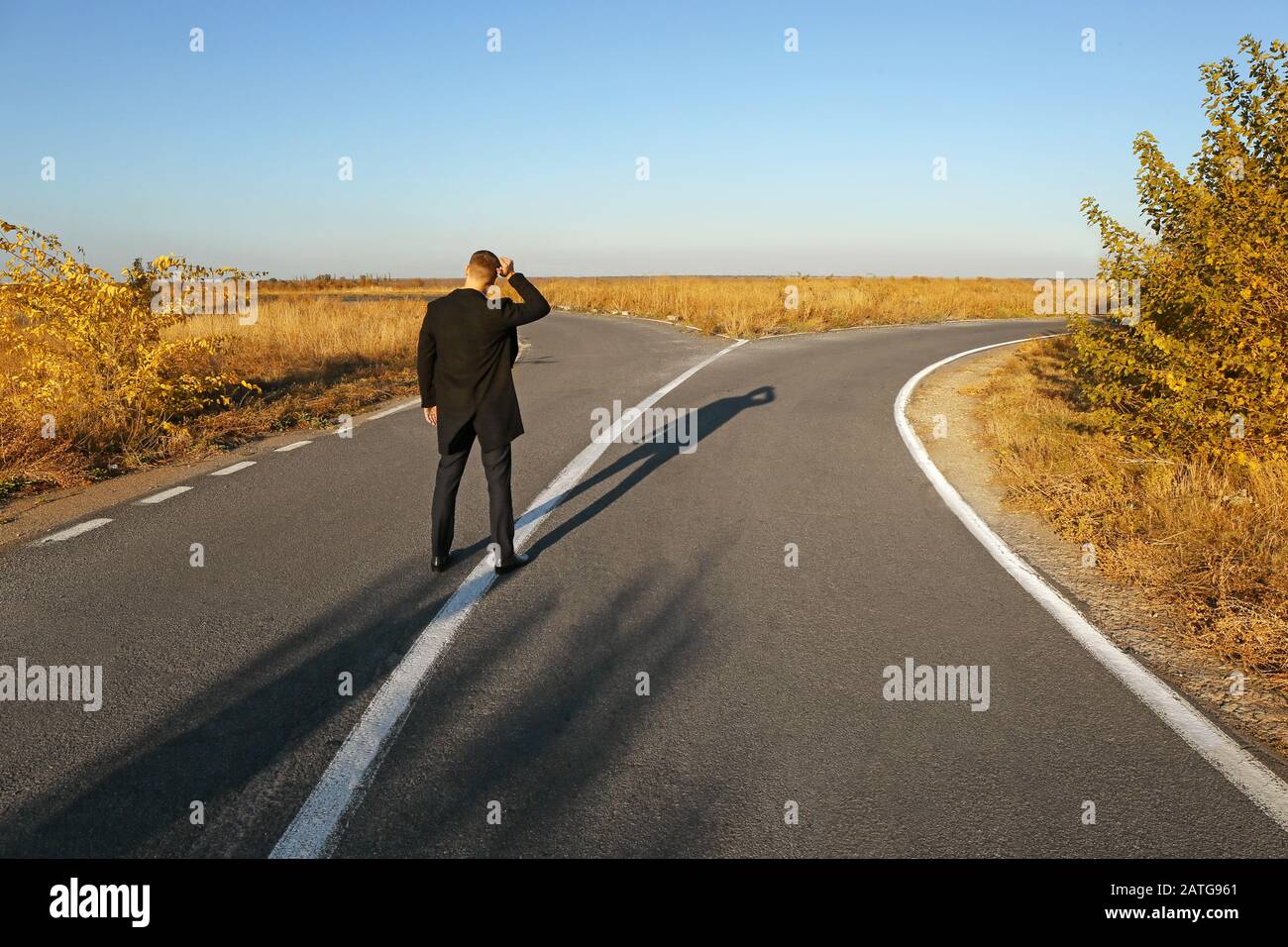 Back view confused young man hi-res stock photography and images - Alamy