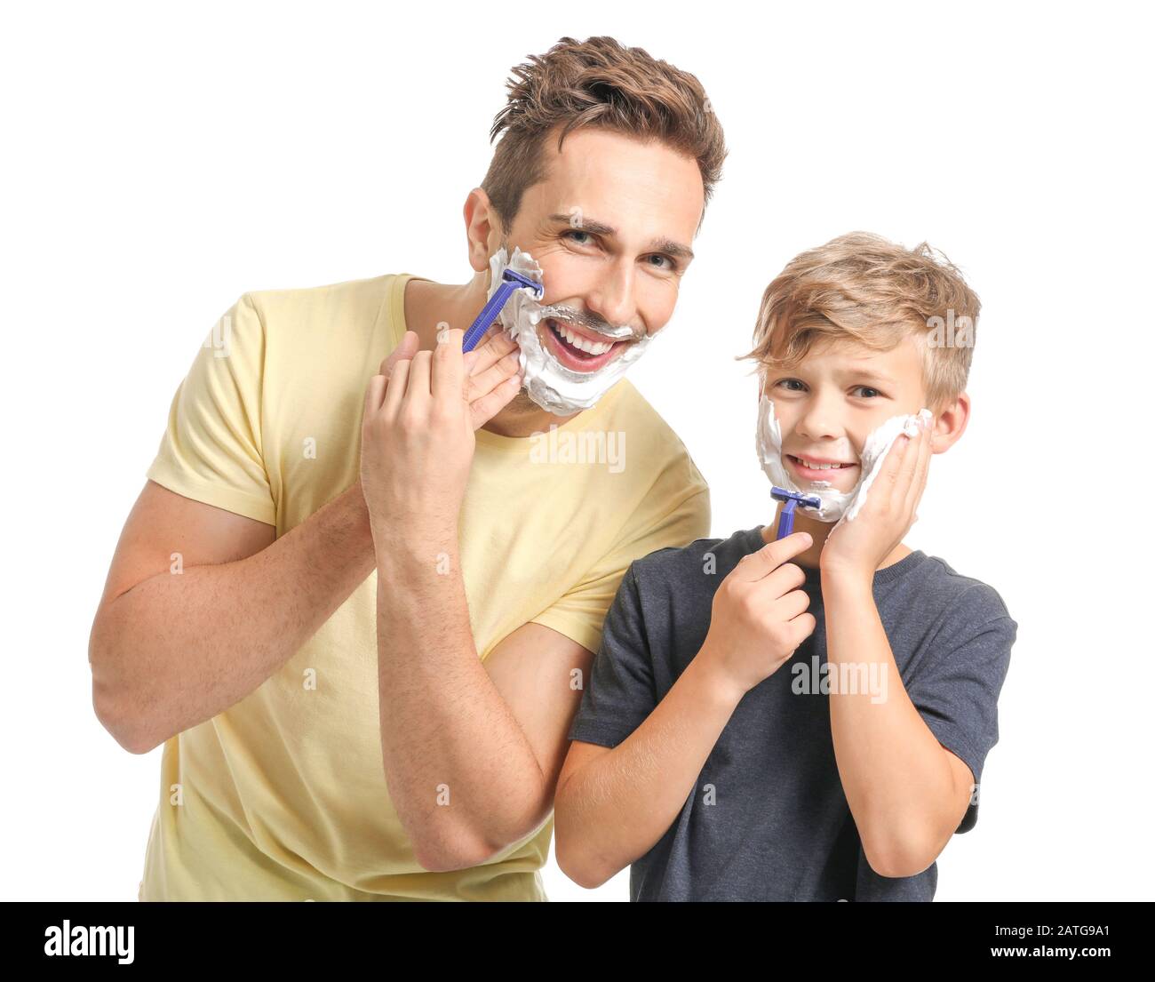 Father and his little son shaving against white background Stock Photo ...