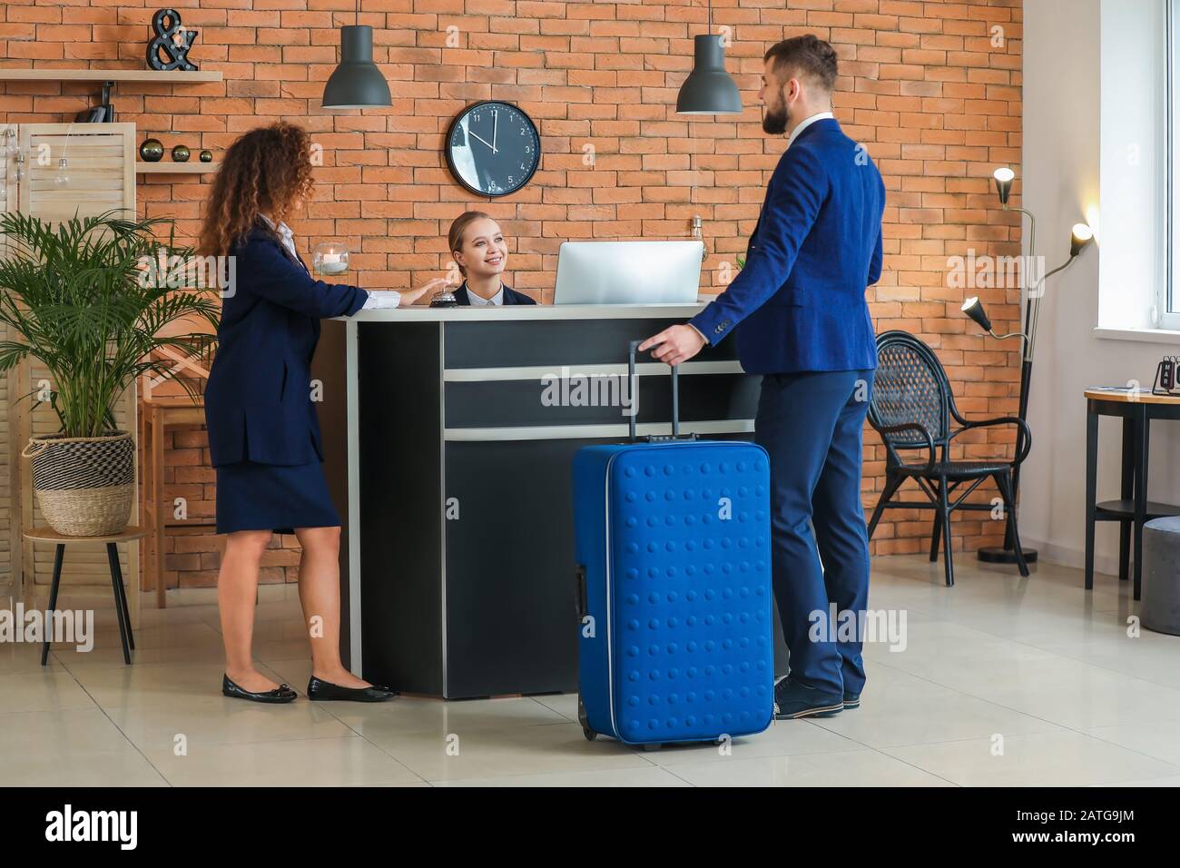 Hotel reception desk african hi-res stock photography and images - Alamy