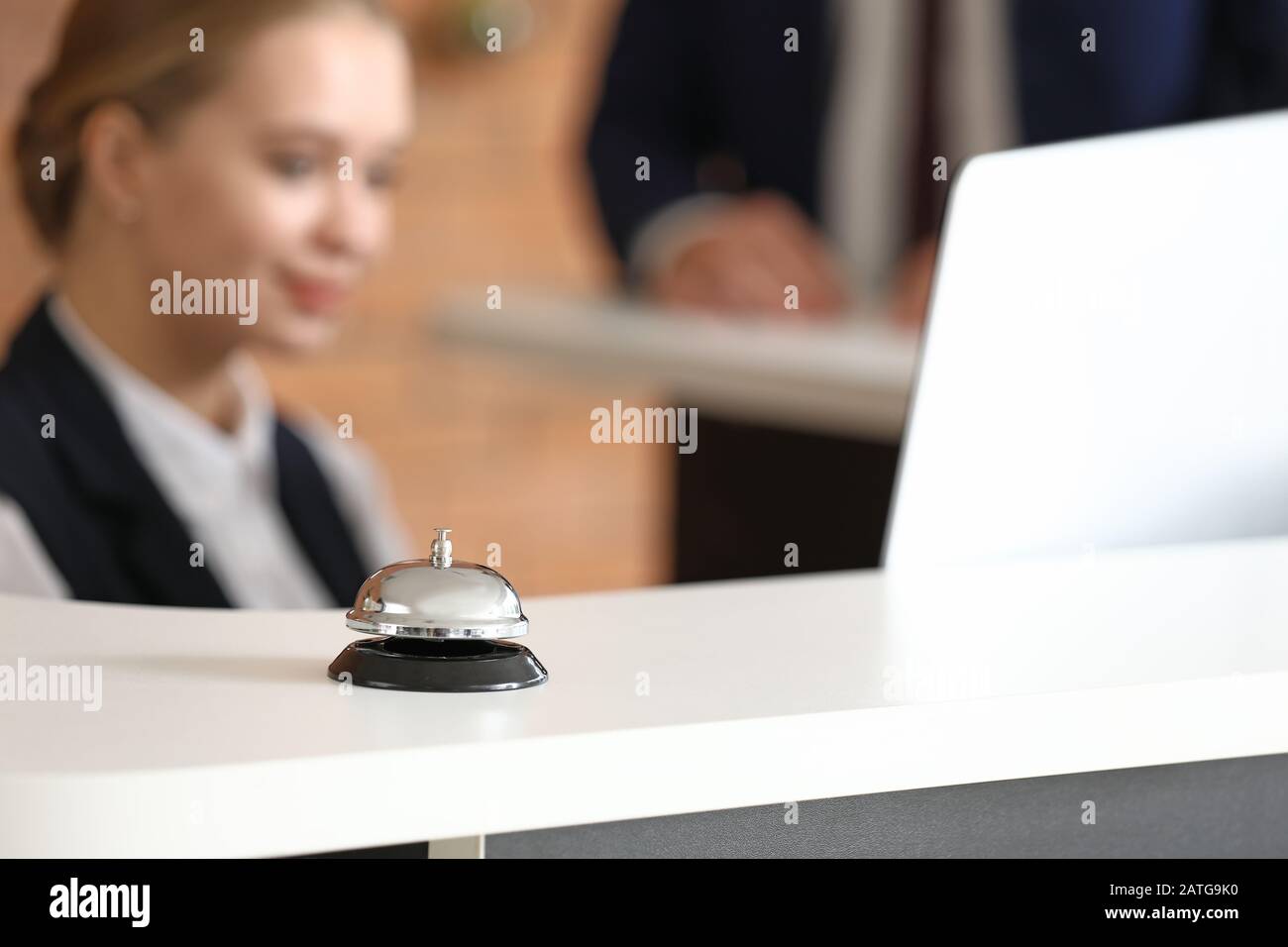 Service bell on reception desk in hotel Stock Photo - Alamy