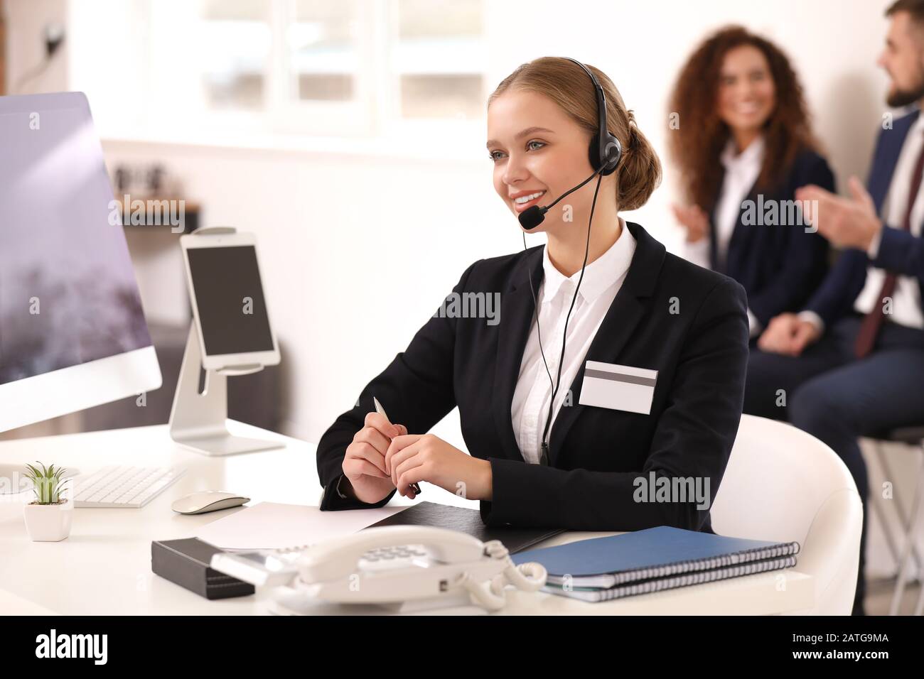 Female secretary working in office Stock Photo - Alamy