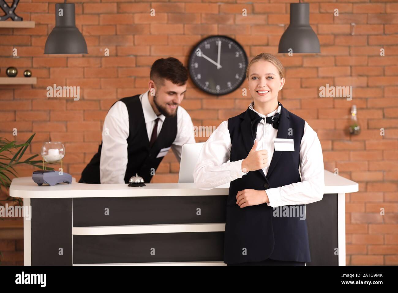 Gesture hotel reception hi-res stock photography and images - Alamy