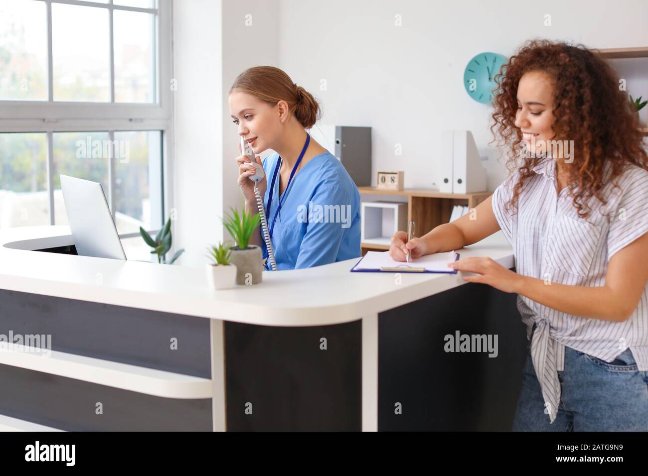 African hospital receptionist hi-res stock photography and images - Alamy