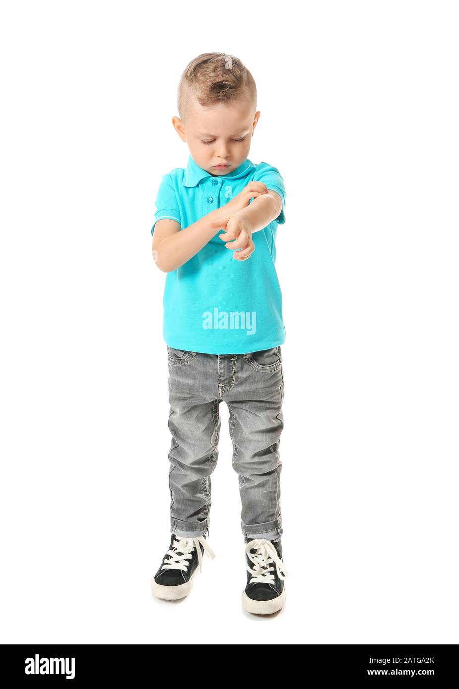 Scratching allergic little boy on white background Stock Photo - Alamy