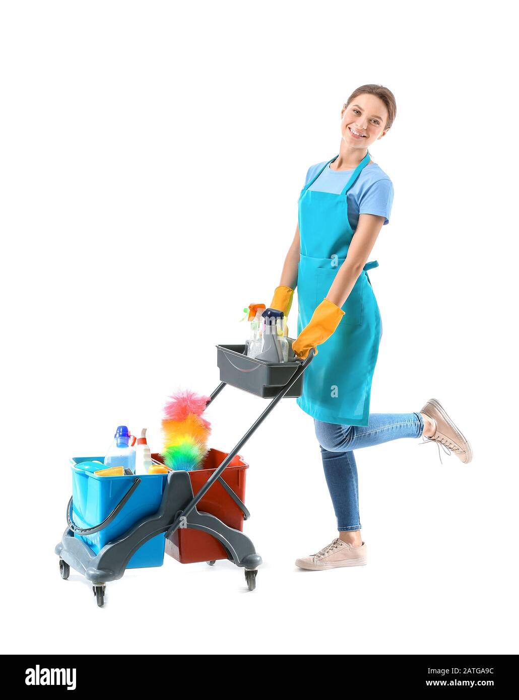 Portrait of janitor with cleaning supplies on white background Stock ...