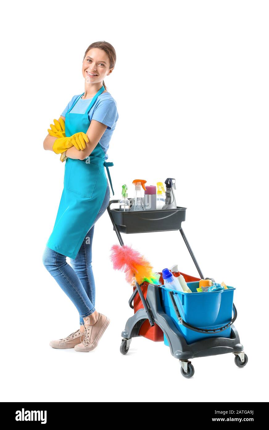 Portrait of janitor with cleaning supplies on white background Stock ...