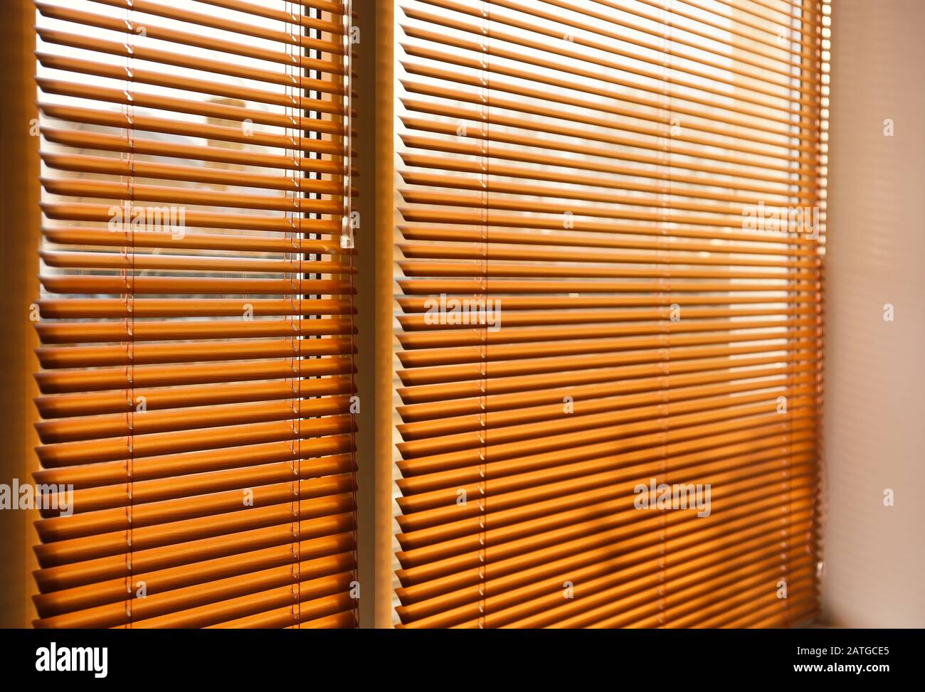 Modern blinds hanging on window Stock Photo - Alamy