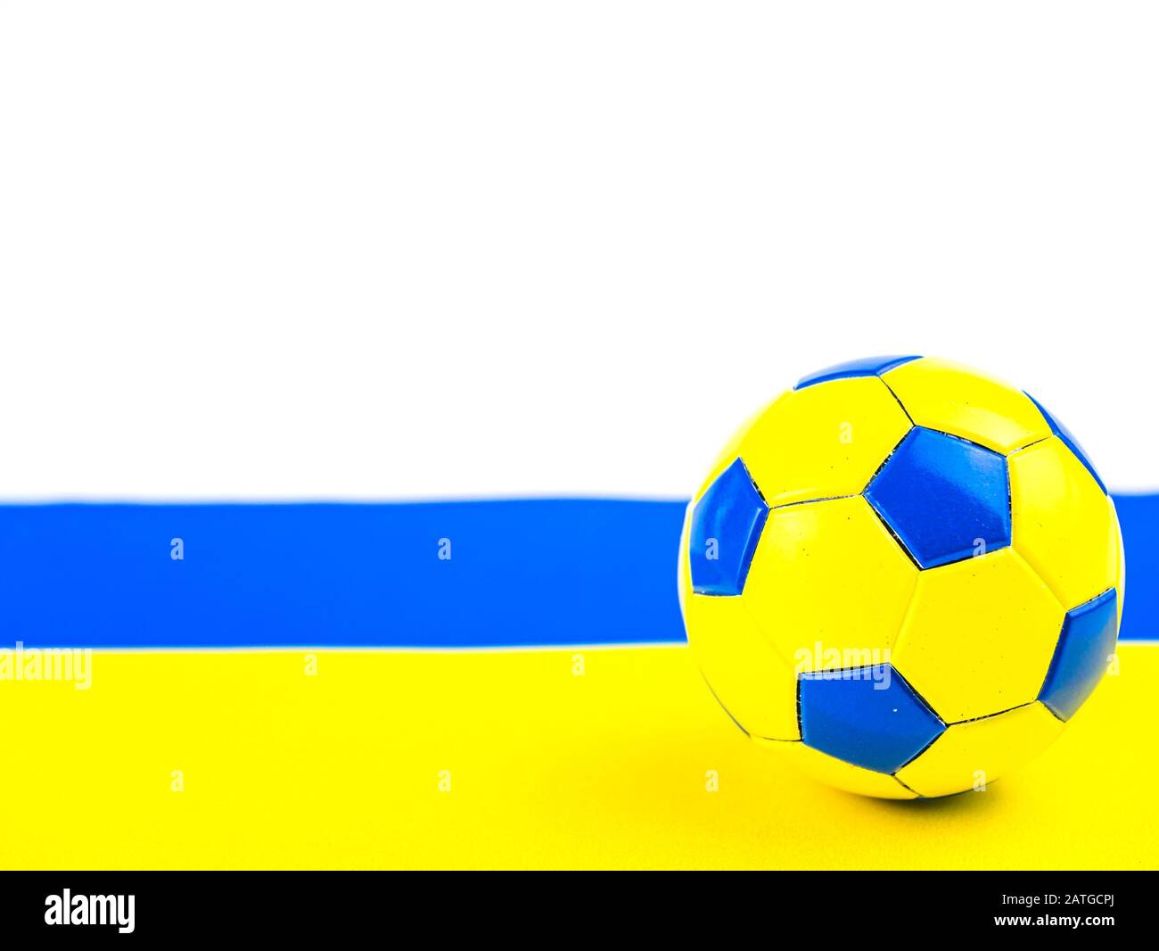 Soccer ball on the background of the national flag of Ukraine Stock ...