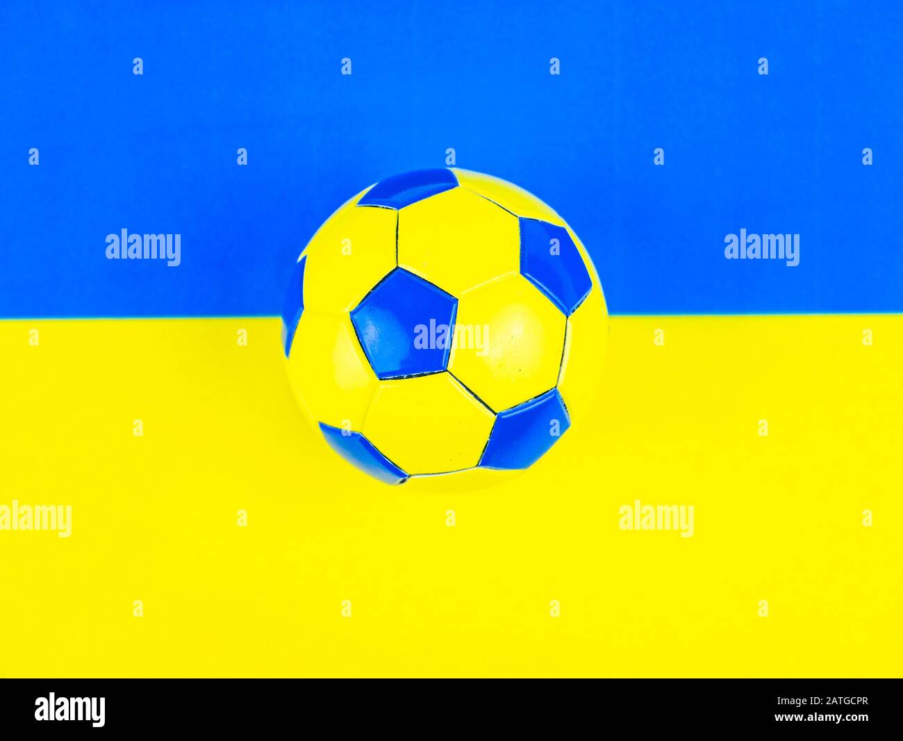 Soccer ball on the background of the national flag of Ukraine Stock ...