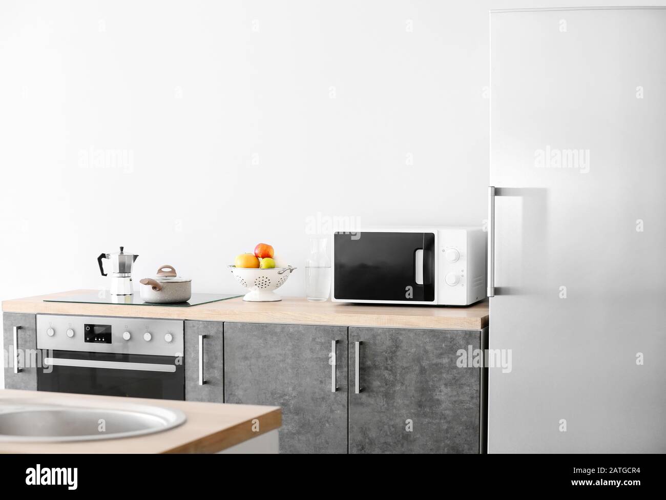 Interior of kitchen with modern microwave oven Stock Photo - Alamy