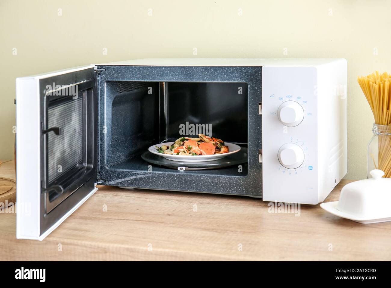 Modern microwave oven in kitchen Stock Photo - Alamy
