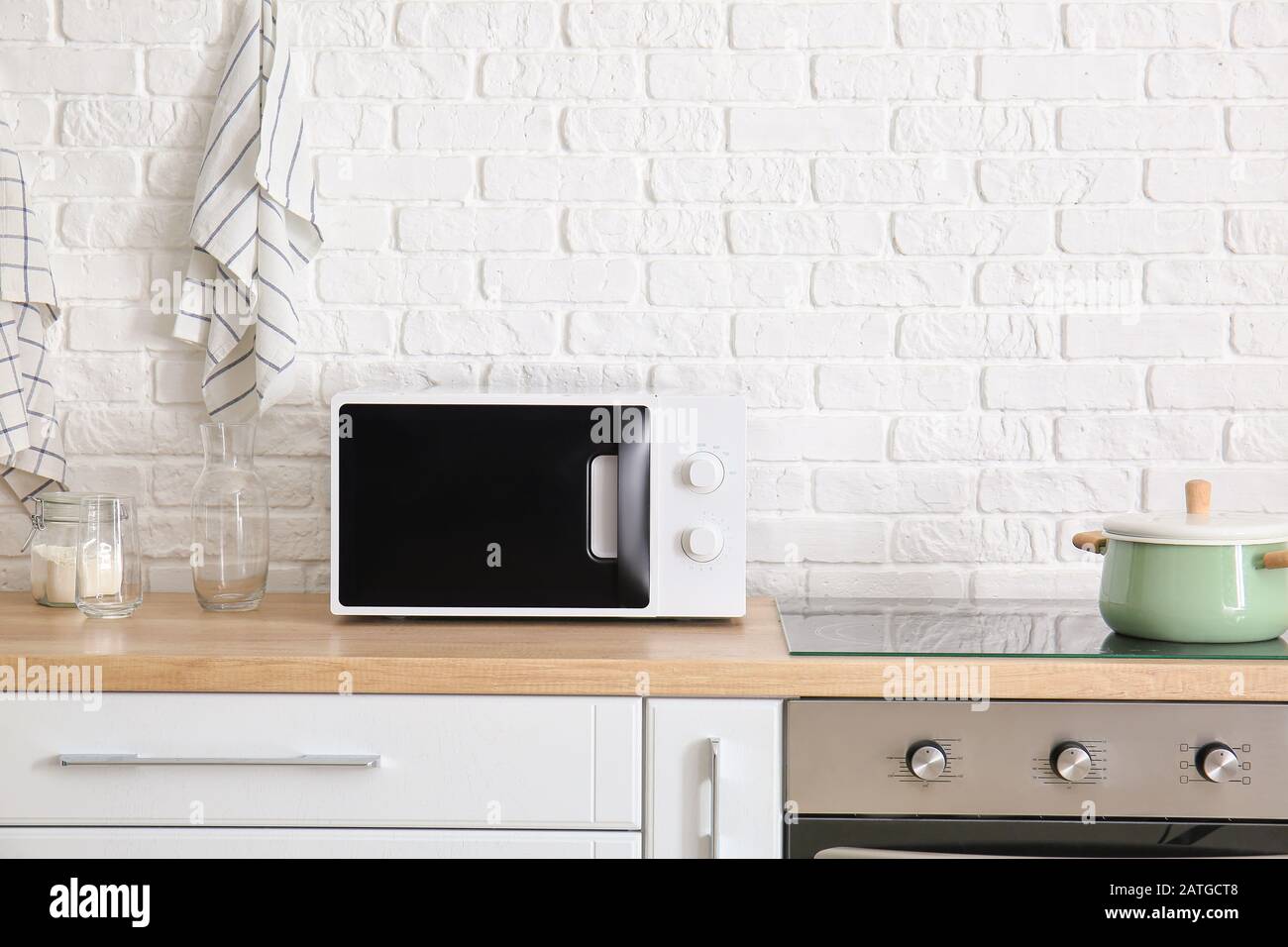 Interior of kitchen with modern microwave oven Stock Photo - Alamy