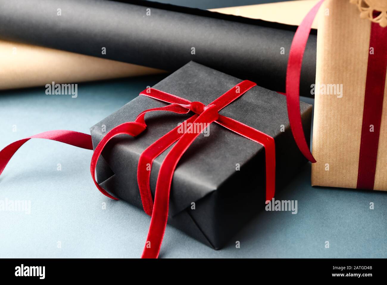 Packed gifts on grey background Stock Photo - Alamy