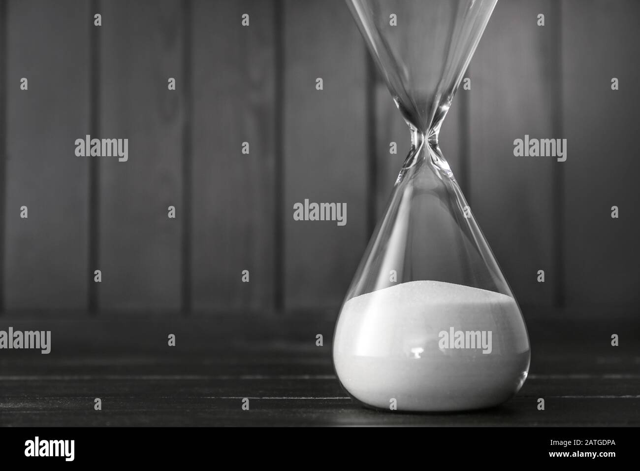 Hourglass on dark background. Time management concept Stock Photo - Alamy