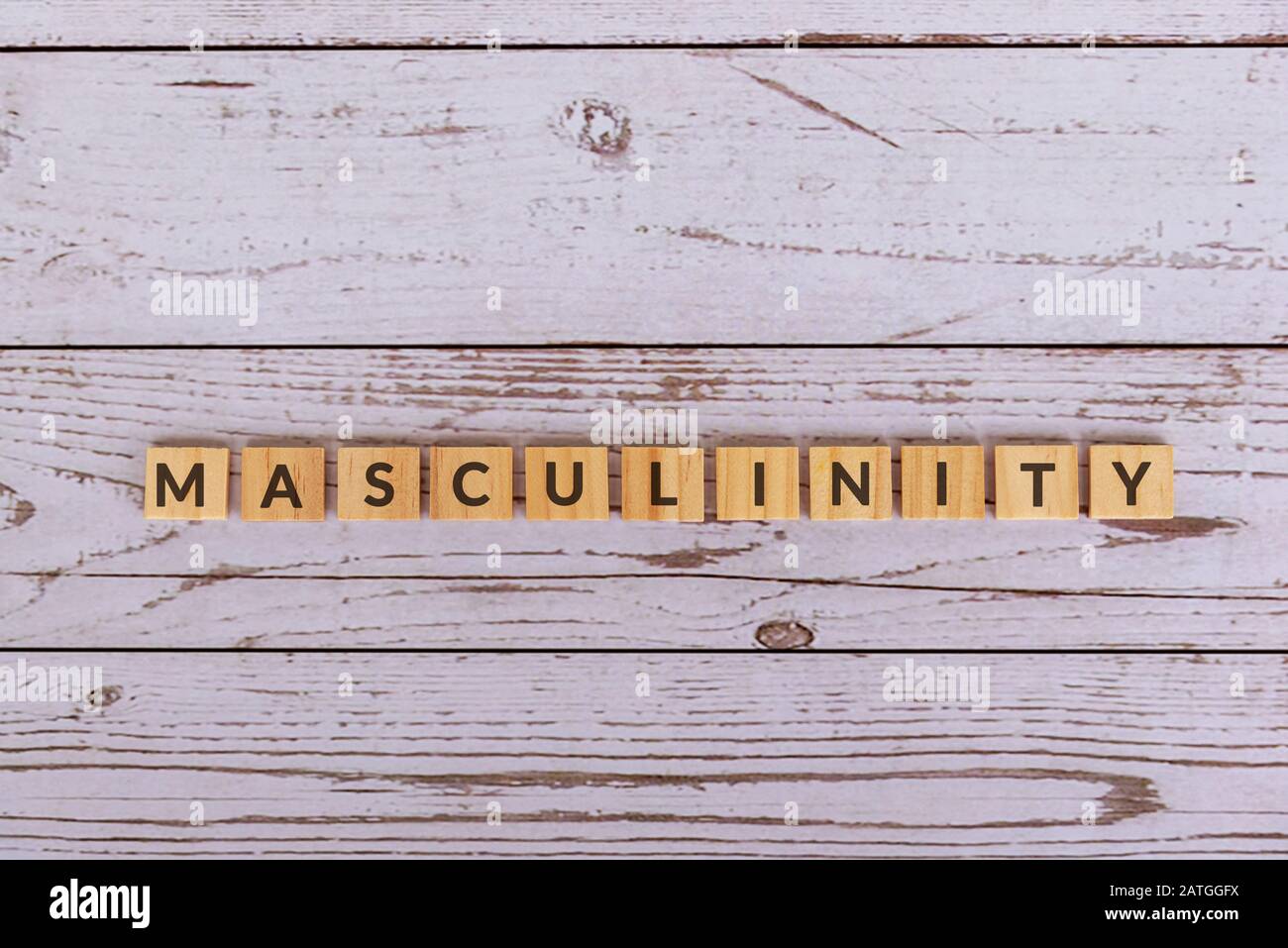 Masculinity text on wood blocks, wooden background Stock Photo - Alamy