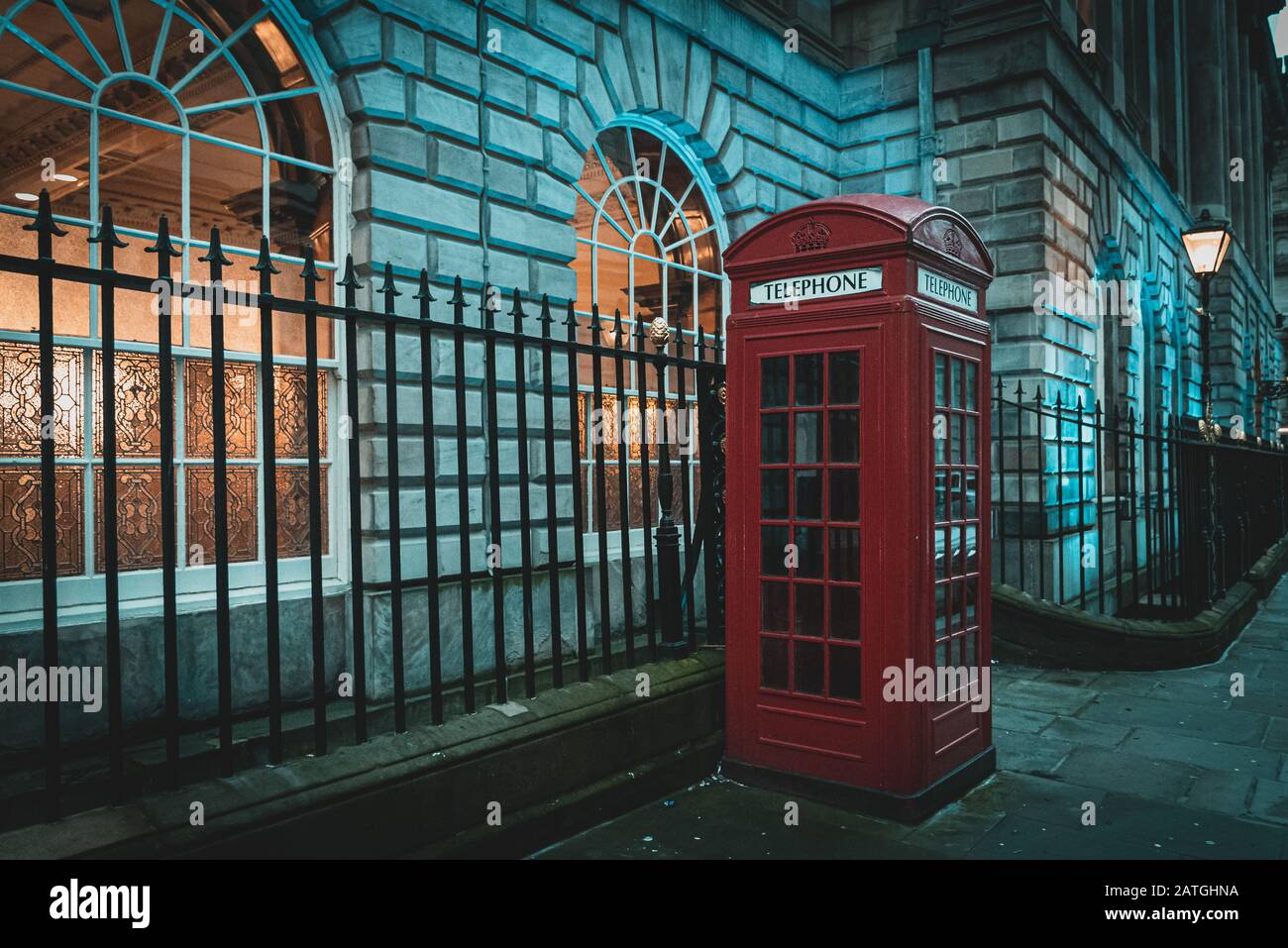 Traditional and iconic old red telephone box in London UK Stock Photo ...