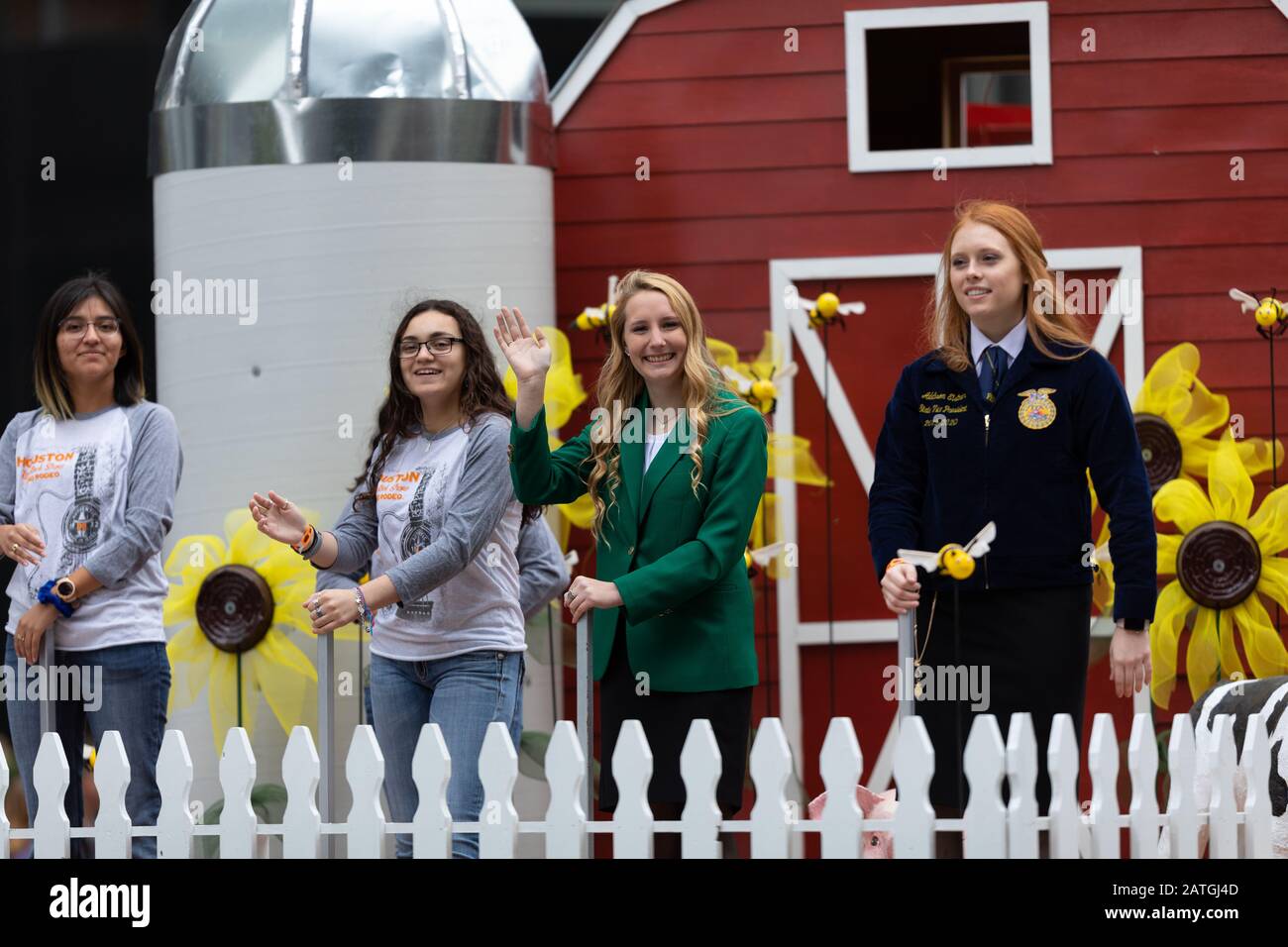 Young woman riding on parade float hi-res stock photography and images ...