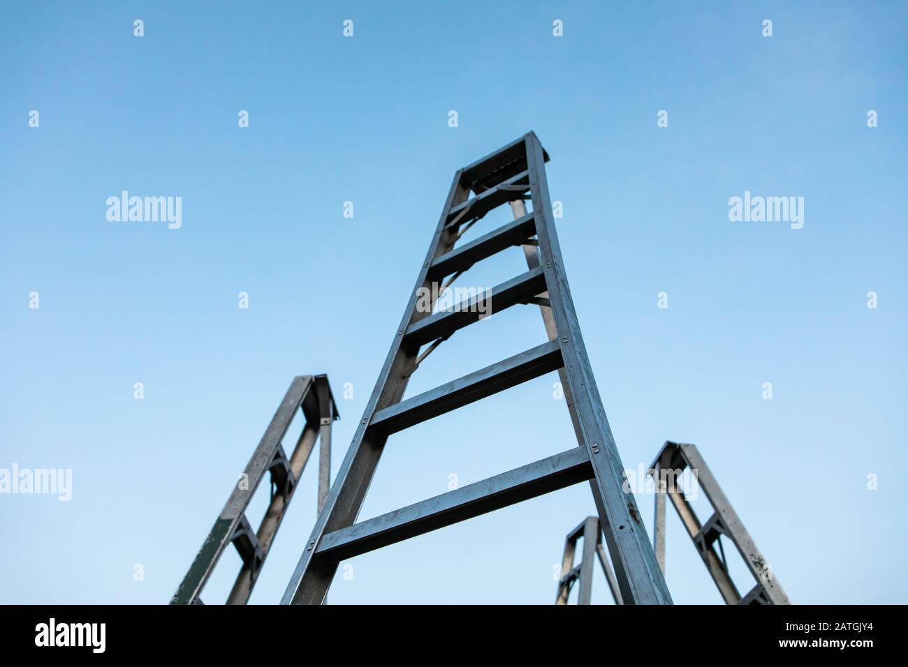 Three ladders hi-res stock photography and images - Alamy