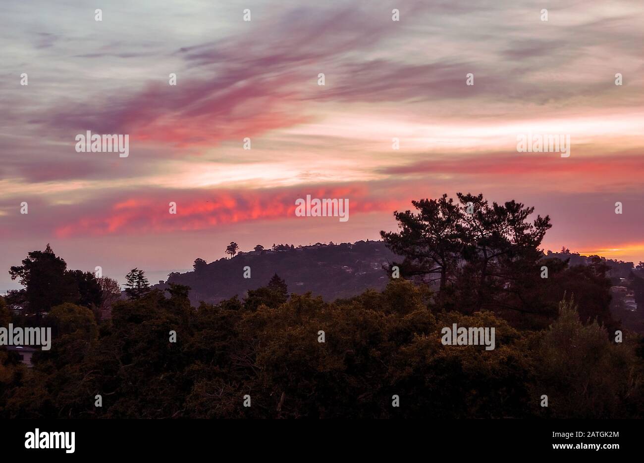 Colorful clouds at sunrise in California. A spectrum of saturated ...