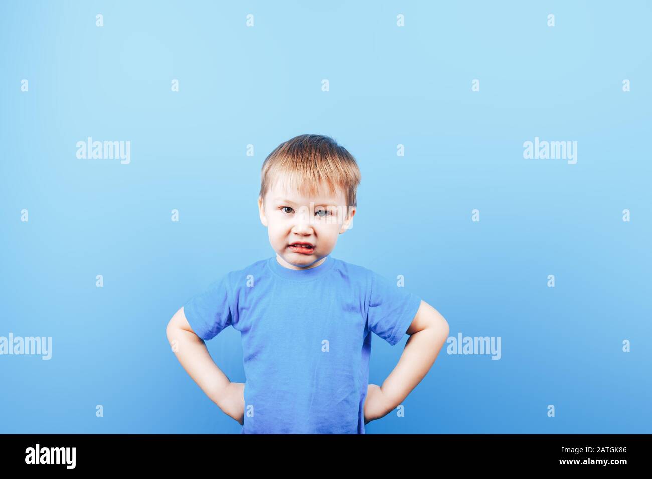 Boy looking up angry Stock Photo - Alamy