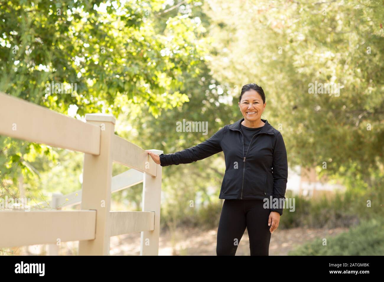 Portrait of a fit Asian woman exercising Stock Photo - Alamy